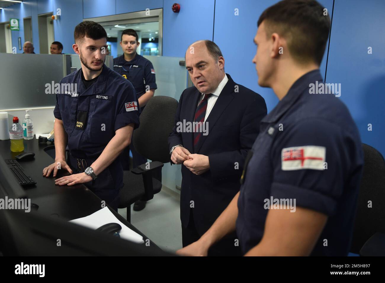 Defence Secretary Ben Wallace (centre) at passport control at ...
