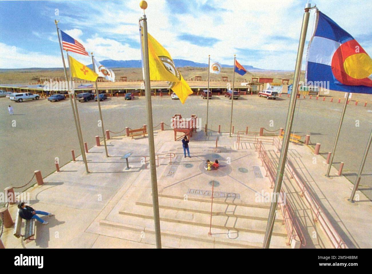 Trail of the Ancients - Flags on the Four Corners Monument. A slight ...