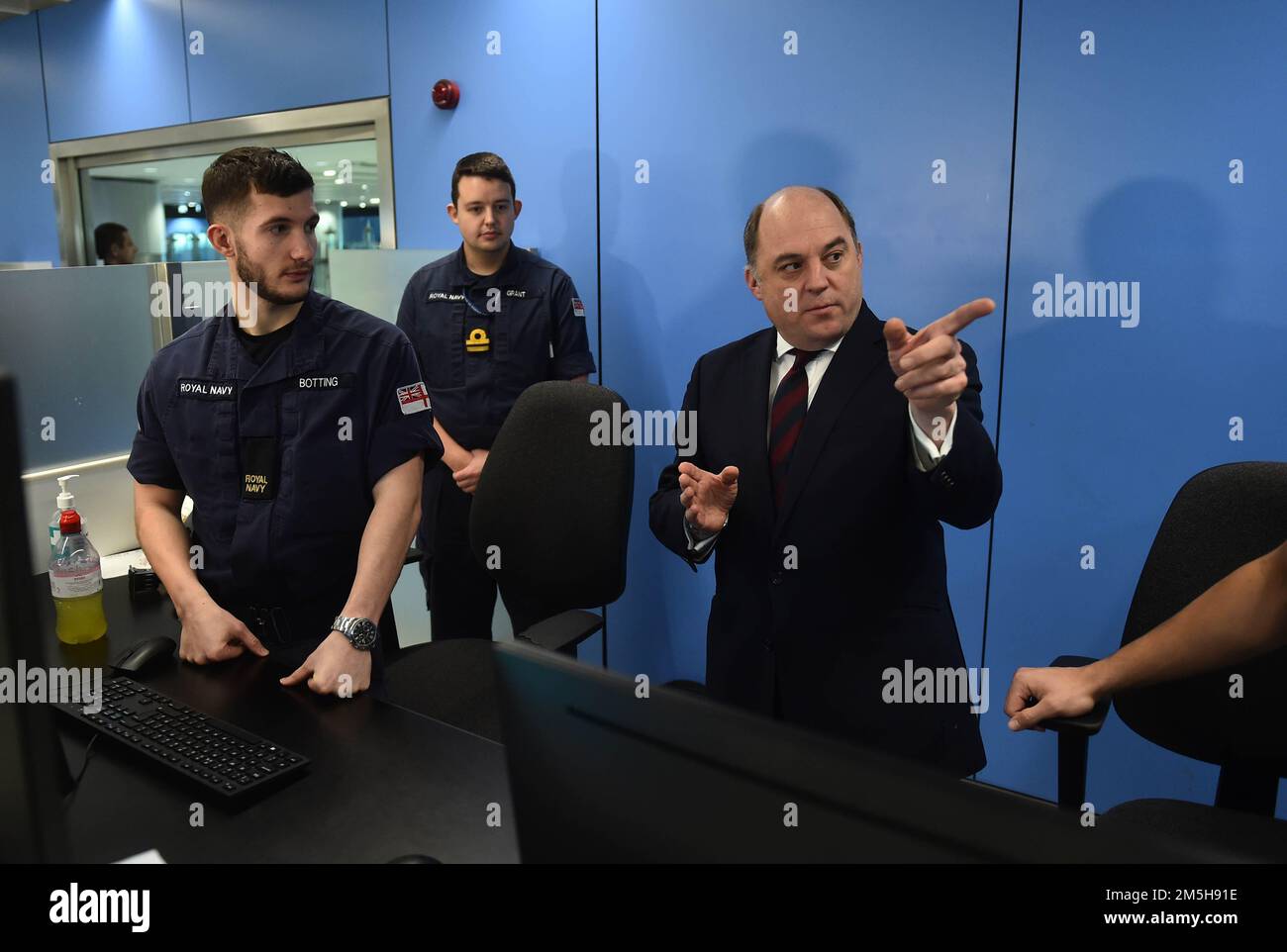 Defence Secretary Ben Wallace (right) at passport control at Manchester ...
