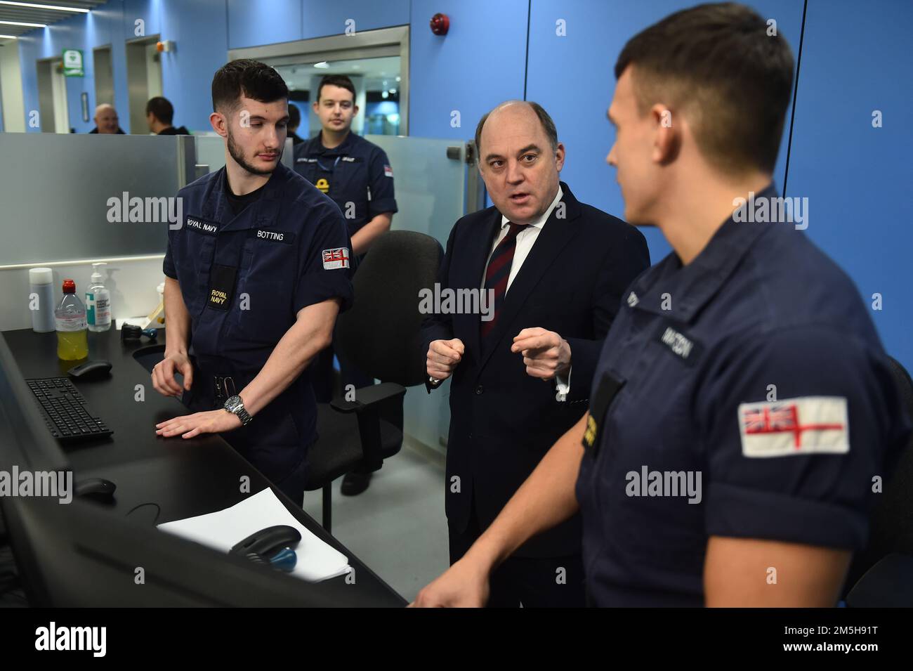 Defence Secretary Ben Wallace (centre) at passport control at ...