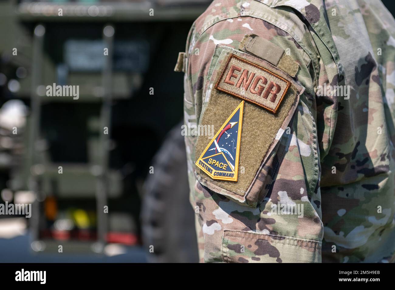 A member of the 45th Civil Engineer Squadron listens to instructions ...