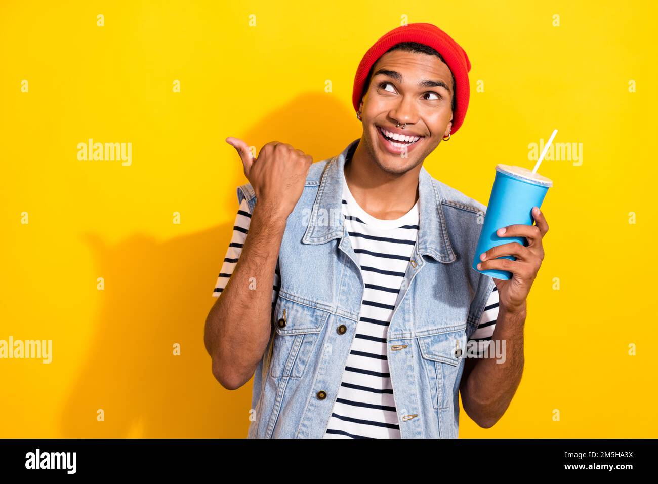 Photo of nice attractive glad man wear trendy clothes arm direct empty ...