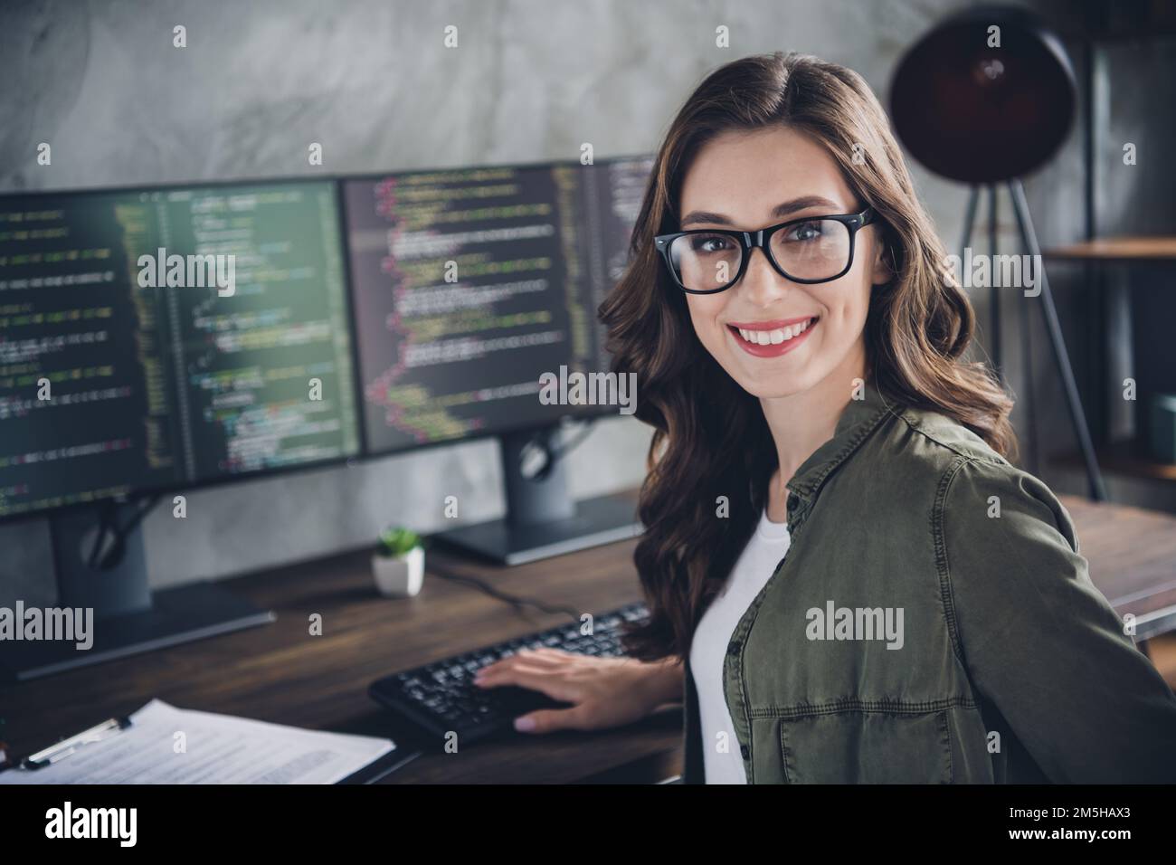 Portrait of cheerful intelligent manager lady toothy smile operating pc ...