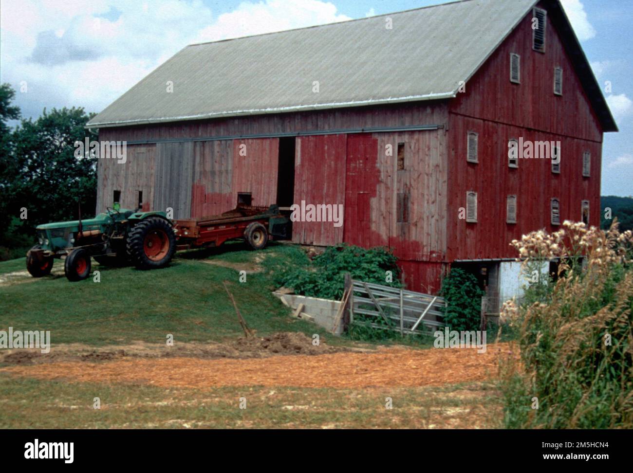Amish Country Byway - Red Barn with Tractor. One appealing aspect of an ...