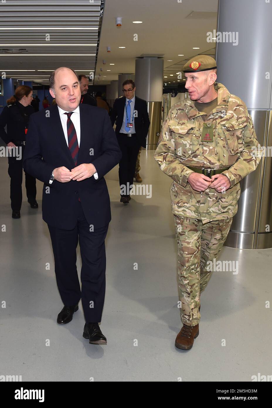 Defence Secretary Ben Wallace (left) at Manchester airport meeting ...