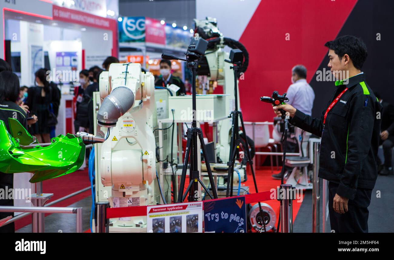 Bangkok, Thailand - November 18, 2022: Kawasaki presenter control robot ...