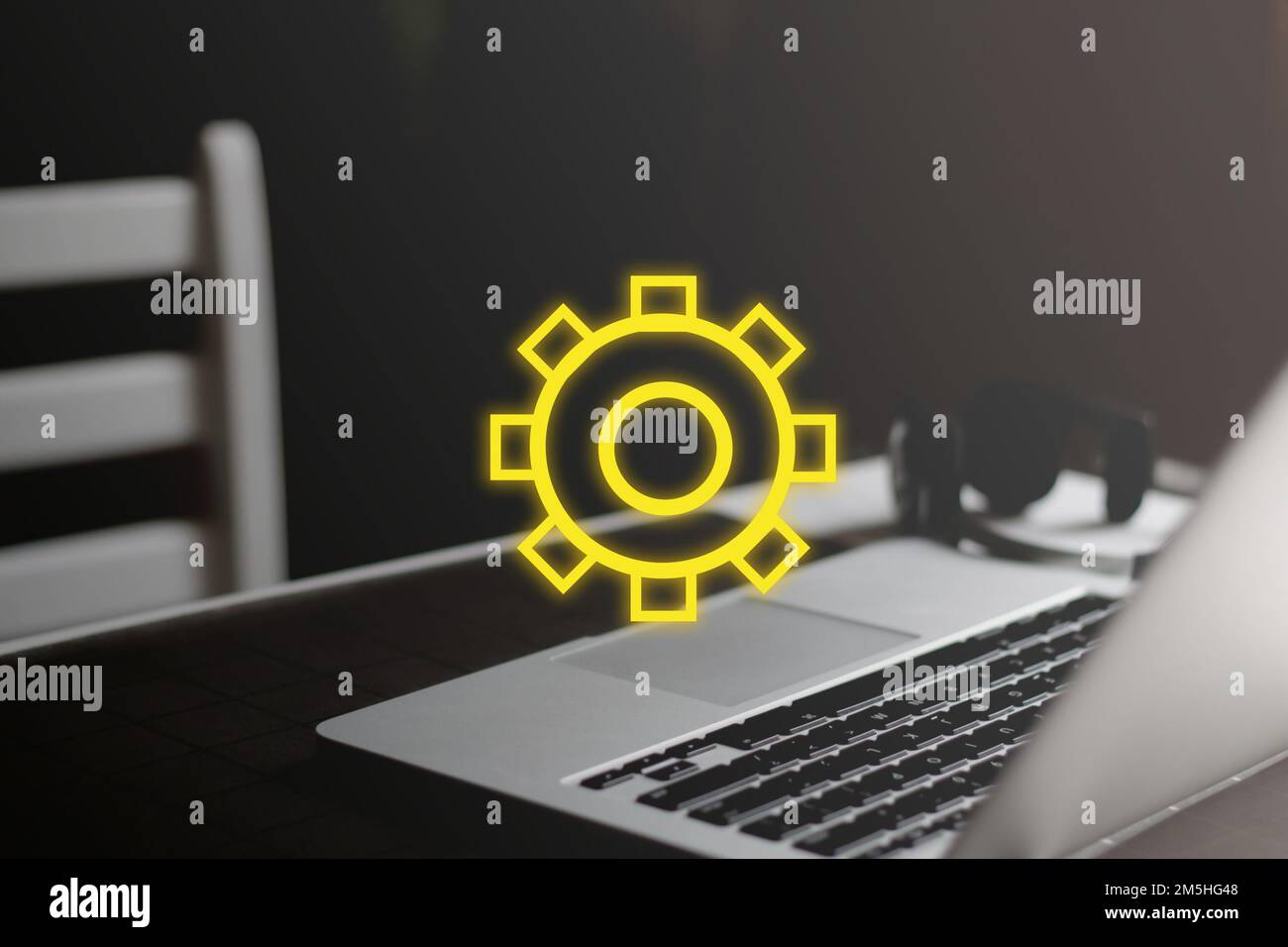 Yellow gear icon on minimal workplace background. Teamwork meeting ...
