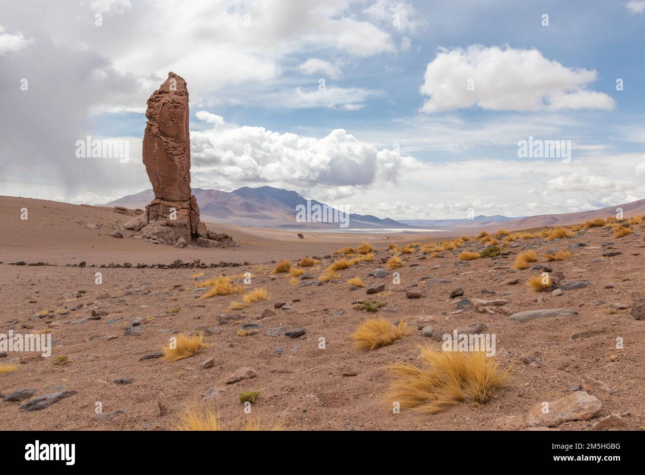 Unstable Monjes de La Pacana rocks in the middle of Atacama Desert in ...