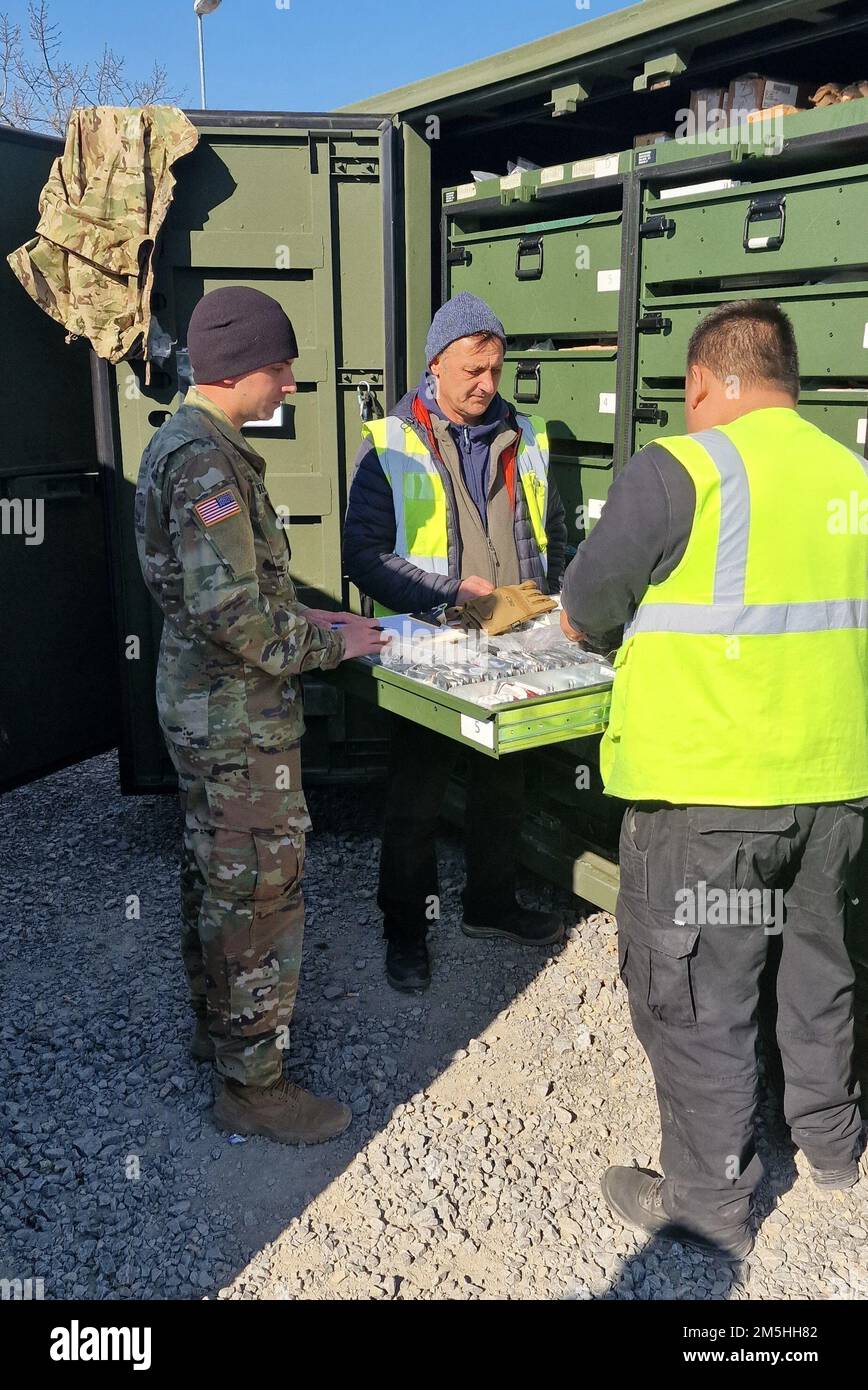 A supply specialist from 1st Armored Brigade Combat Team, 3rd Infantry ...