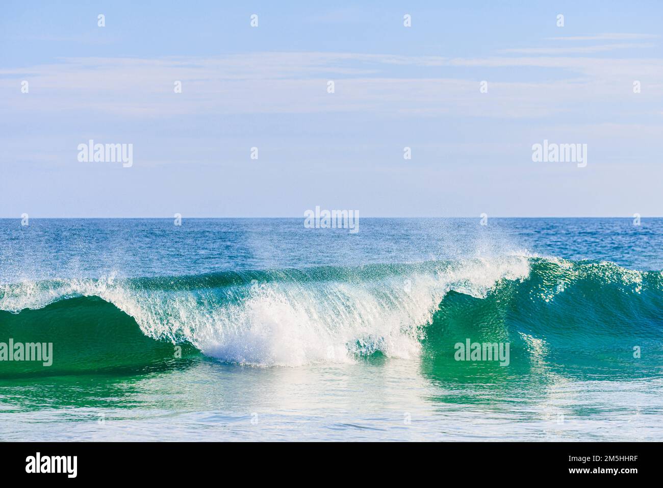 Breaking waves and surf seen from the beach at Kynance Cove on the ...
