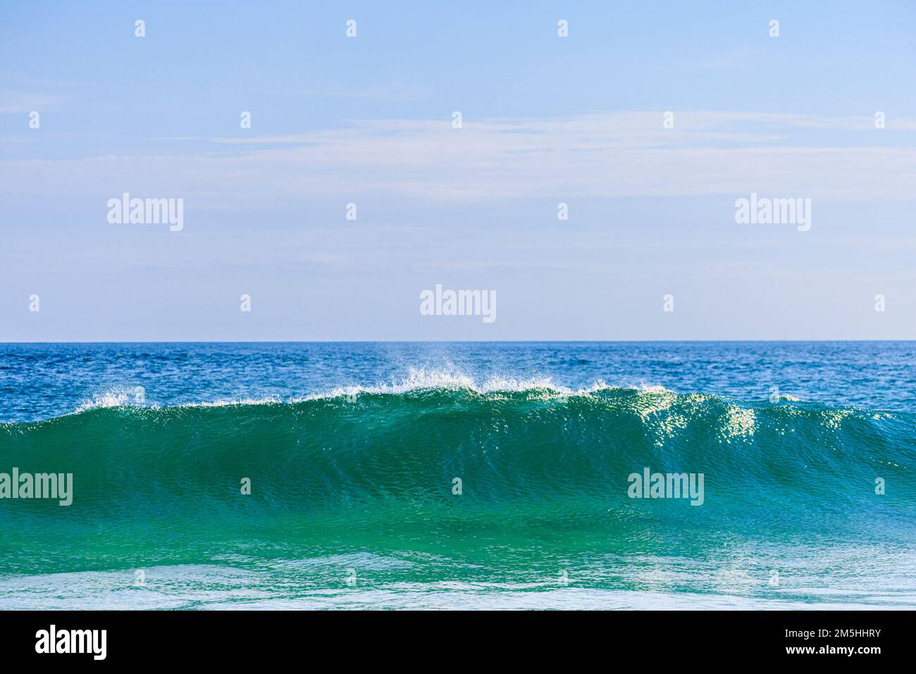 Breaking waves and surf seen from the beach at Kynance Cove on the ...