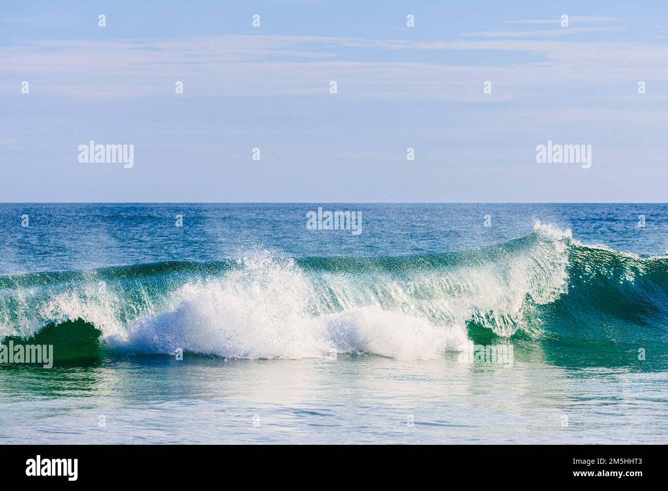Breaking waves and surf seen from the beach at Kynance Cove on the ...