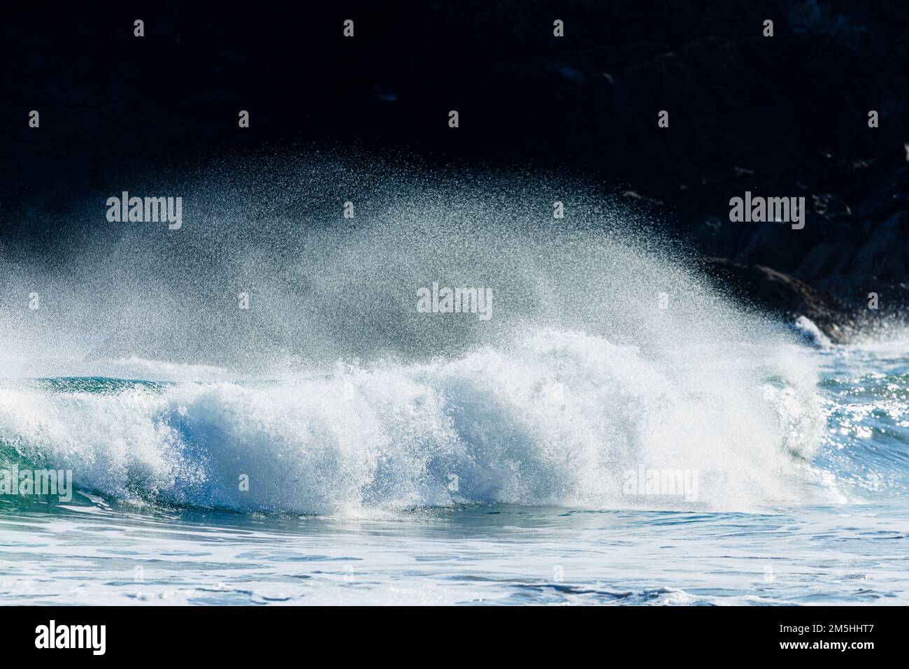 Breaking waves and surf seen from the beach at Kynance Cove on the ...