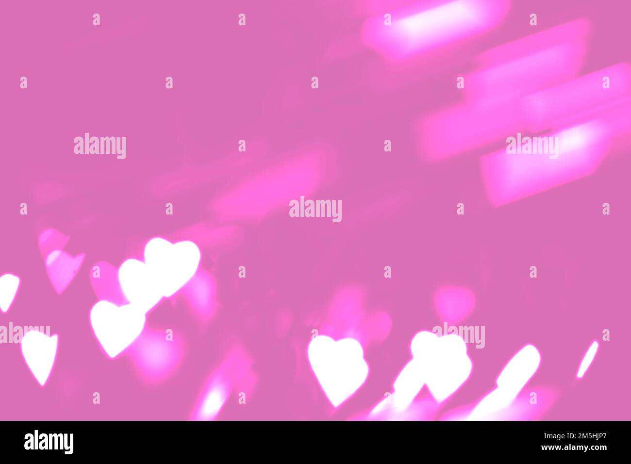 Festive bokeh background in the form of hearts for Valentine's Day. Soft focus Stock Photo - Alamy