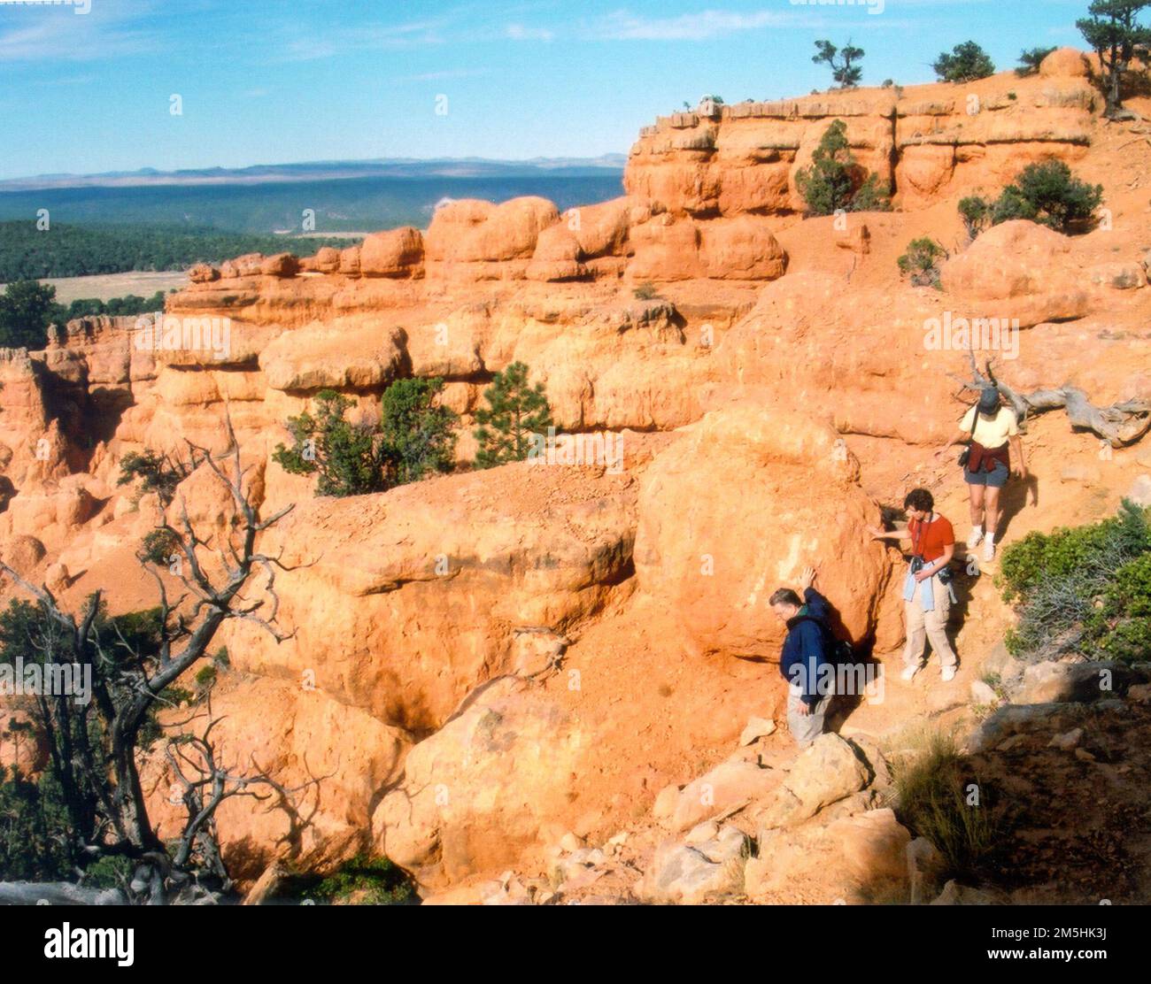 Scenic Byway 12 - Hikers Descending the Arches Trail. These three ...