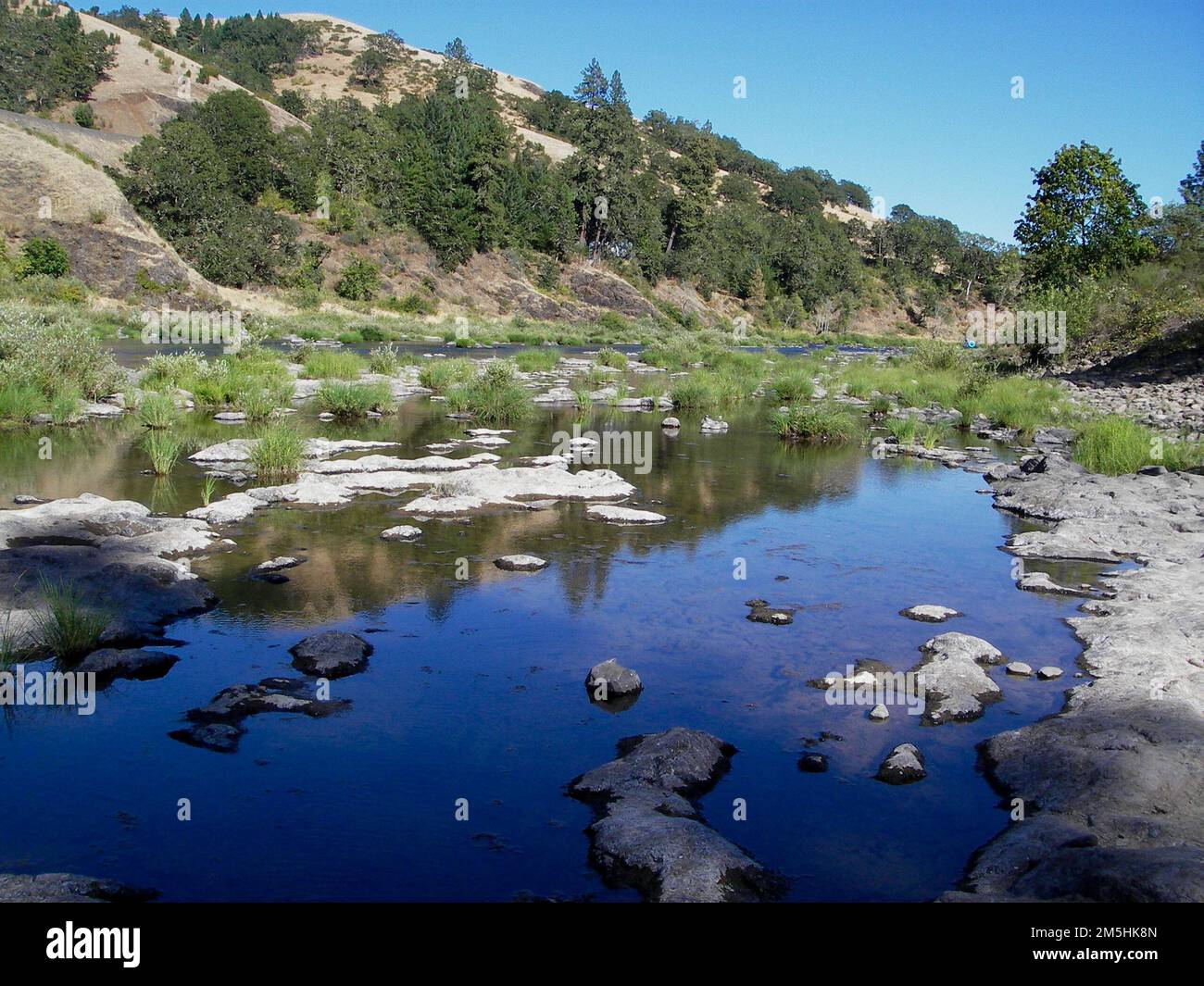 Whistler's Bend Park. Sunlight falls on Whistler's Bend Park ...
