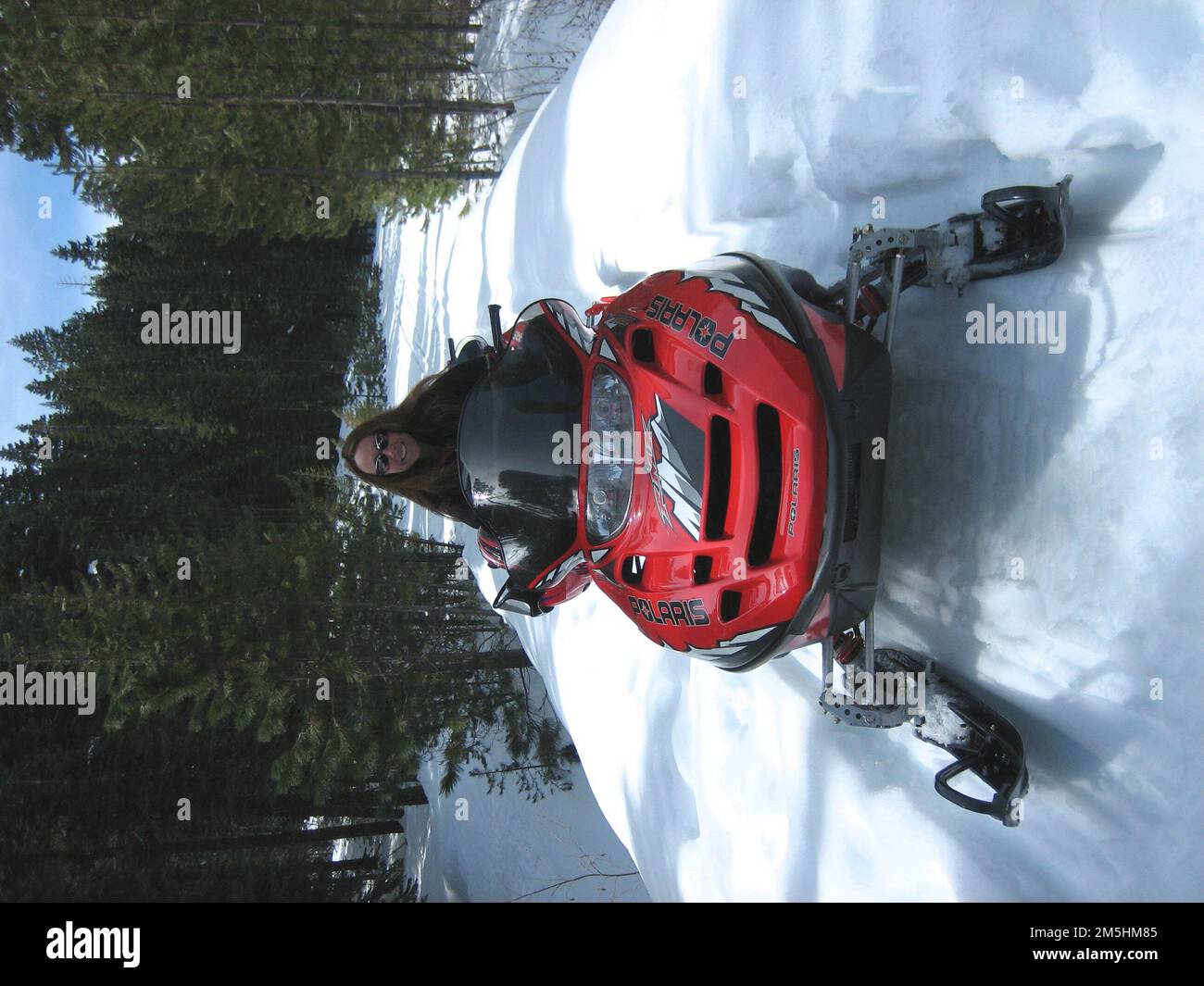 Snowmobile ride through forest hi-res stock photography and images - Alamy