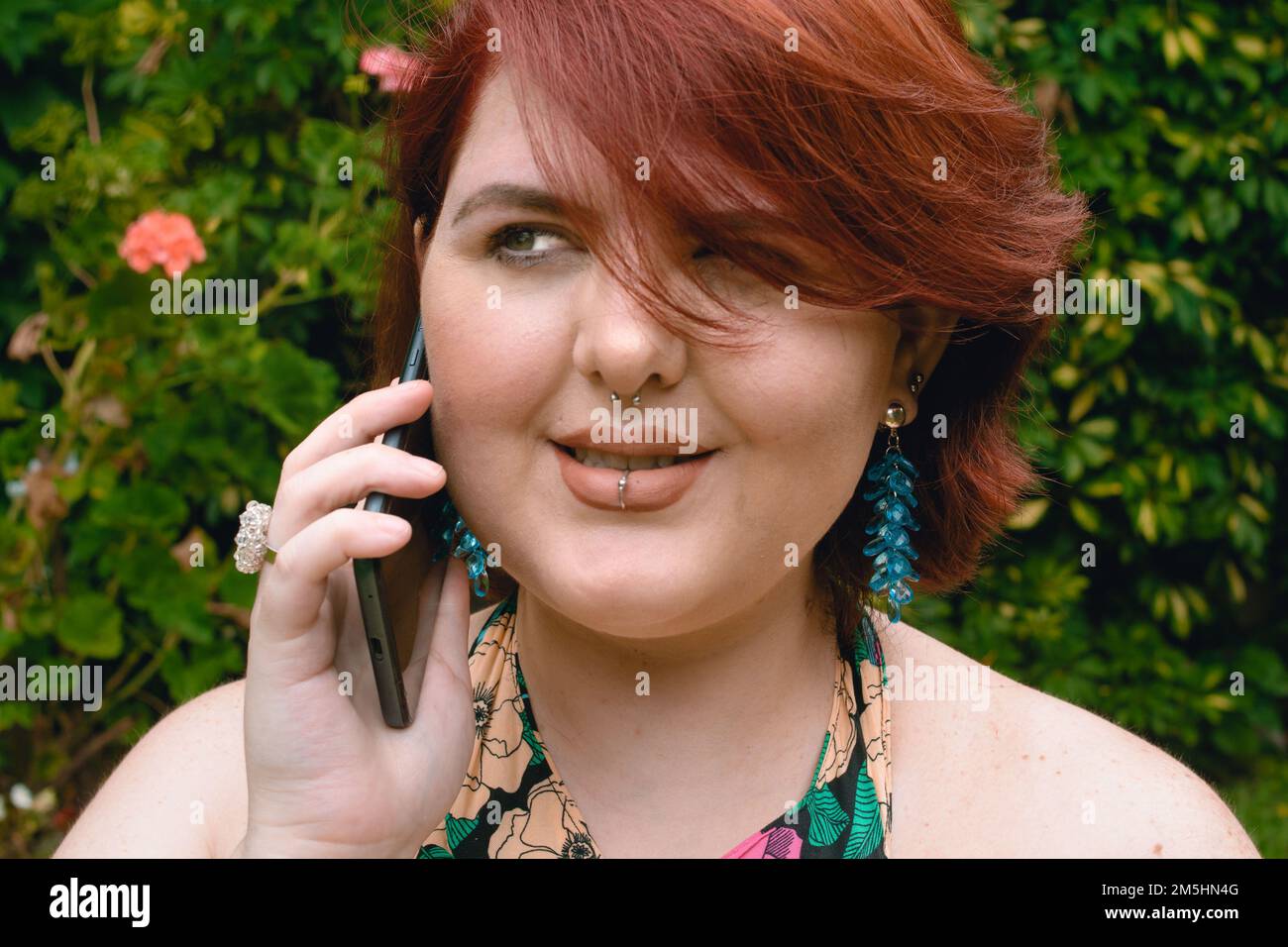 Young Caucasian Latina woman of Argentinian ethnicity, with short red ...