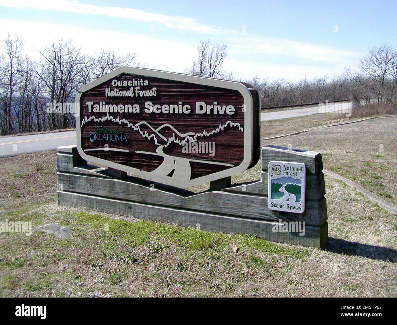 Talimena Scenic Drive - Oklahoma State Sign. Travelers pass this sign made of wood and stone as ...