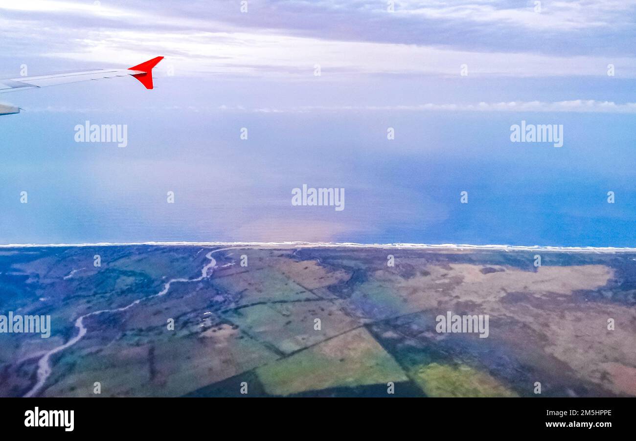 Flying in plane over coast of Oaxaca in beautiful Mexico Stock Photo ...