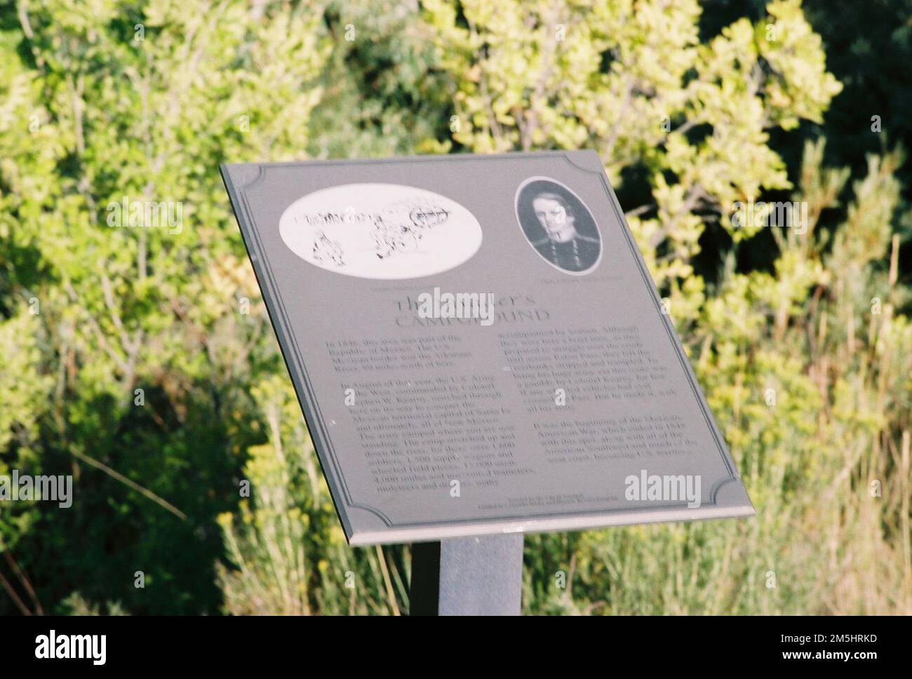 Santa Fe Trail - Interpretive Sign on the Riverwalk. Green foliage ...