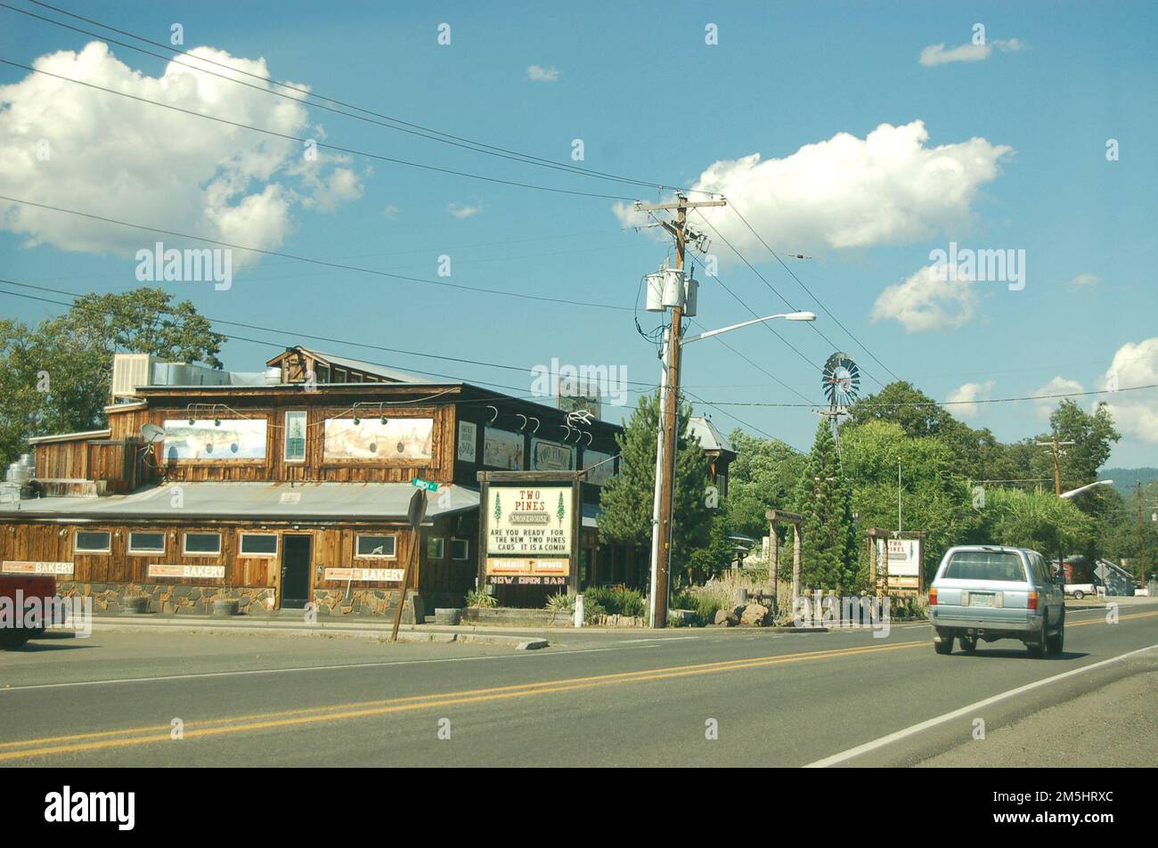 Rogue-Umpqua Scenic Byway - South Shady Cove. A windmill rises over a ...