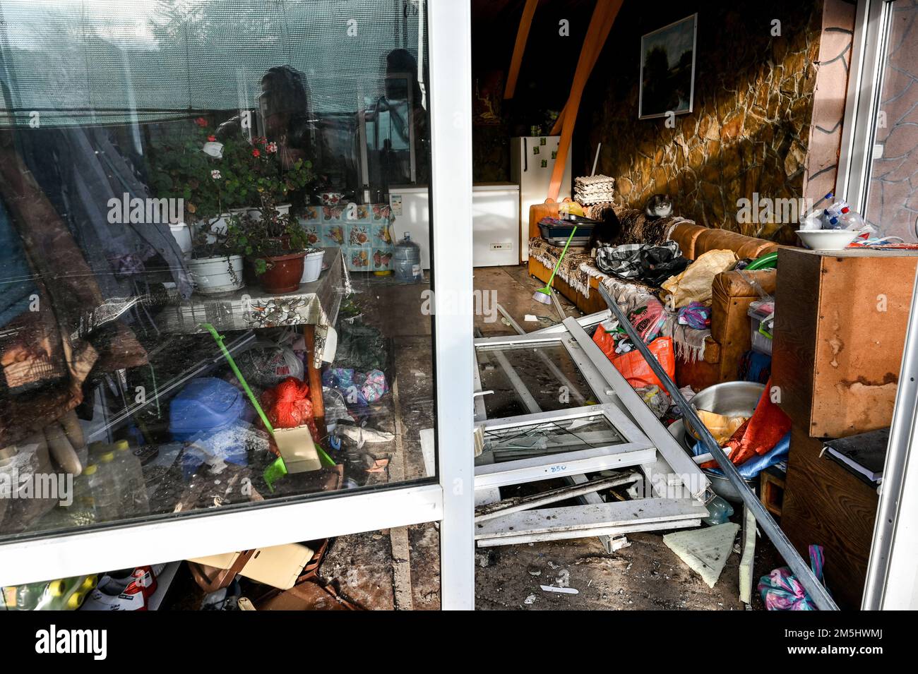 STEPNE, UKRAINE - DECEMBER 29, 2022 - The broken furniture is seen in a house destroyed in a ...