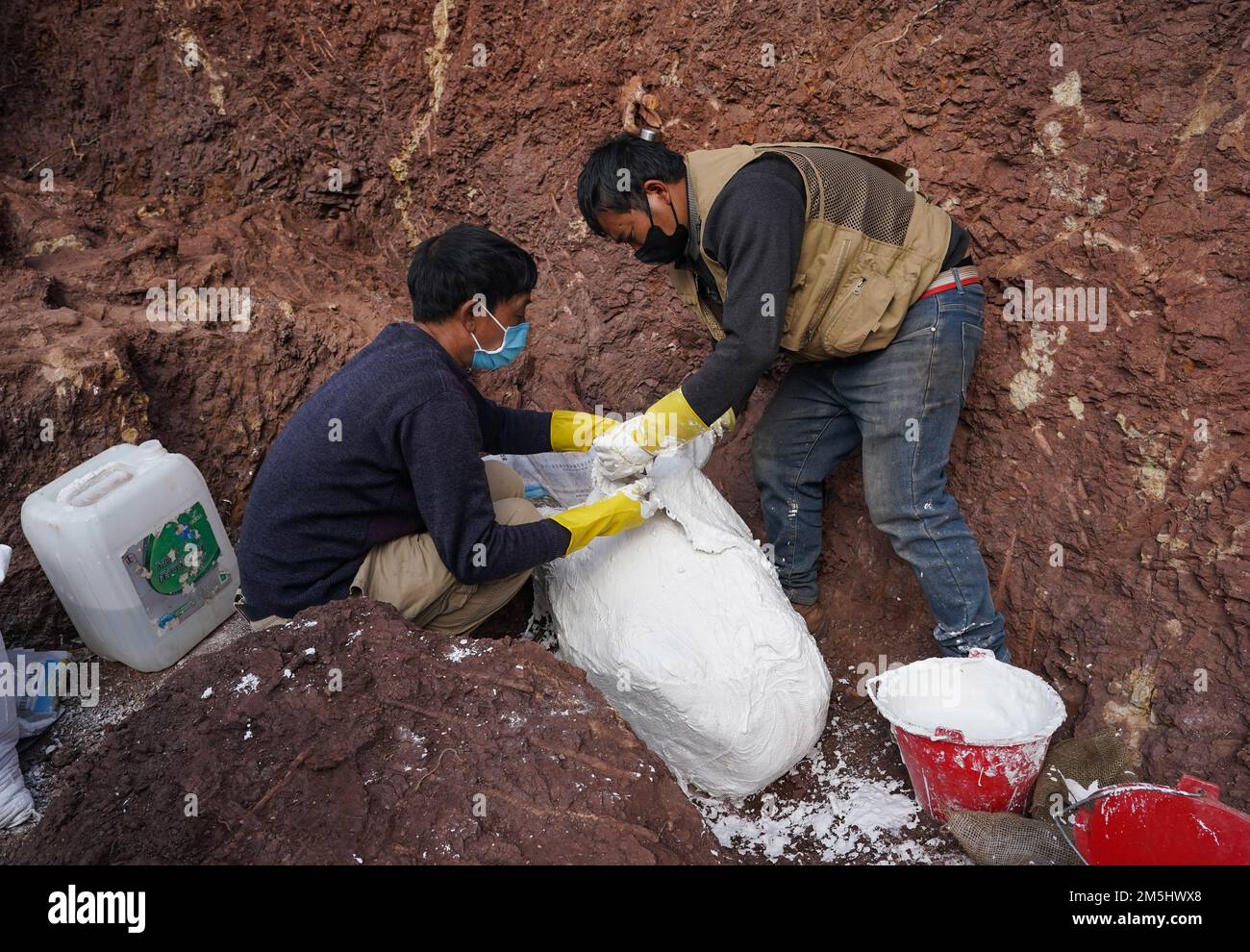 Chuxiong, China's Yunnan Province. 28th Dec, 2022. Workers work at a ...
