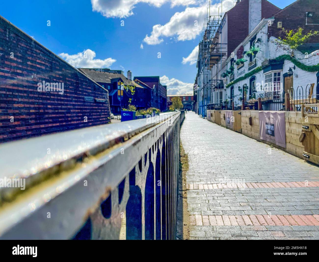 The empty street against the background of the blue sky. Birmingham ...