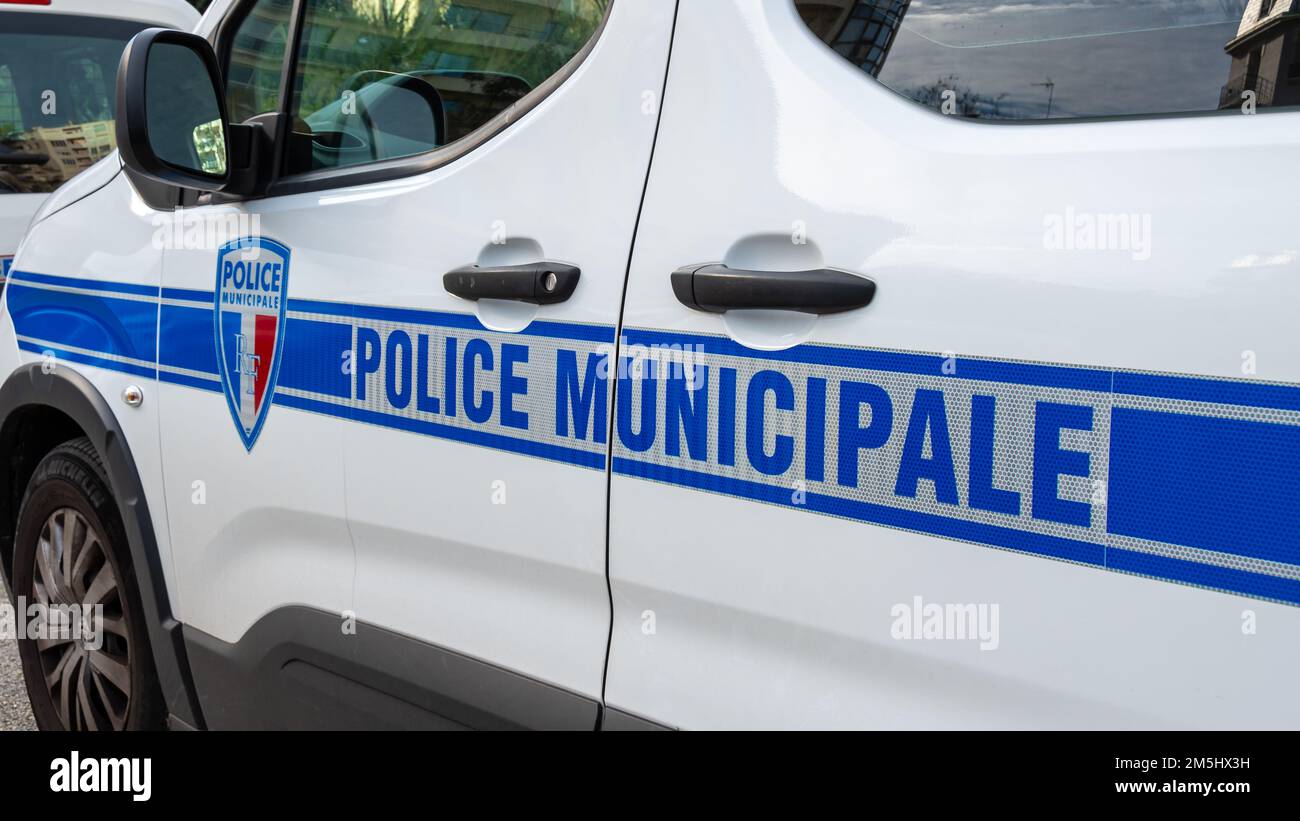 Close up of a "Police municipale" marking written in French on the side ...