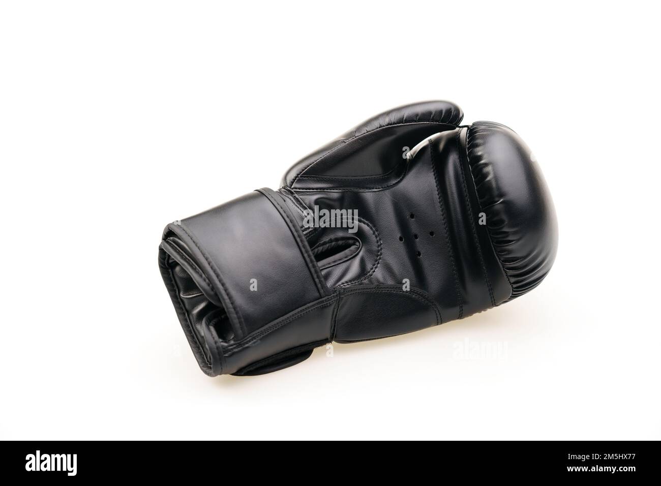 A single black boxing glove isolated on a white background Stock Photo ...
