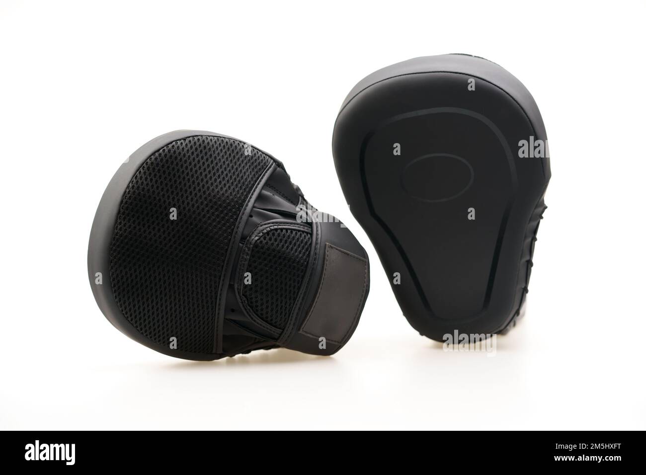 A pair of black boxing pads isolated on a white background Stock Photo ...