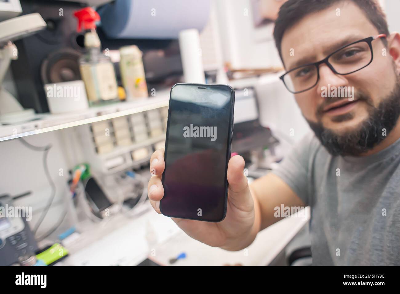 Technician repairs motherboard smartphone hi-res stock photography and ...