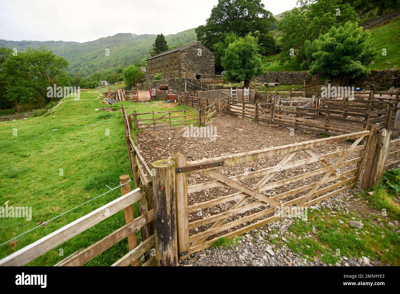 Disused farm buildings and fencing, the lake district national park, UK ...