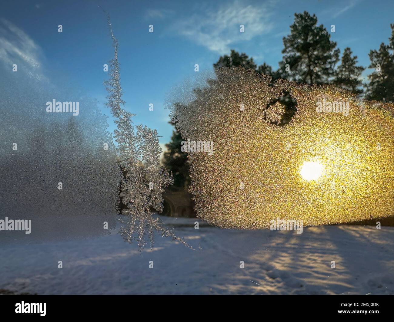 Frost and sun on morning winter window Stock Photo - Alamy