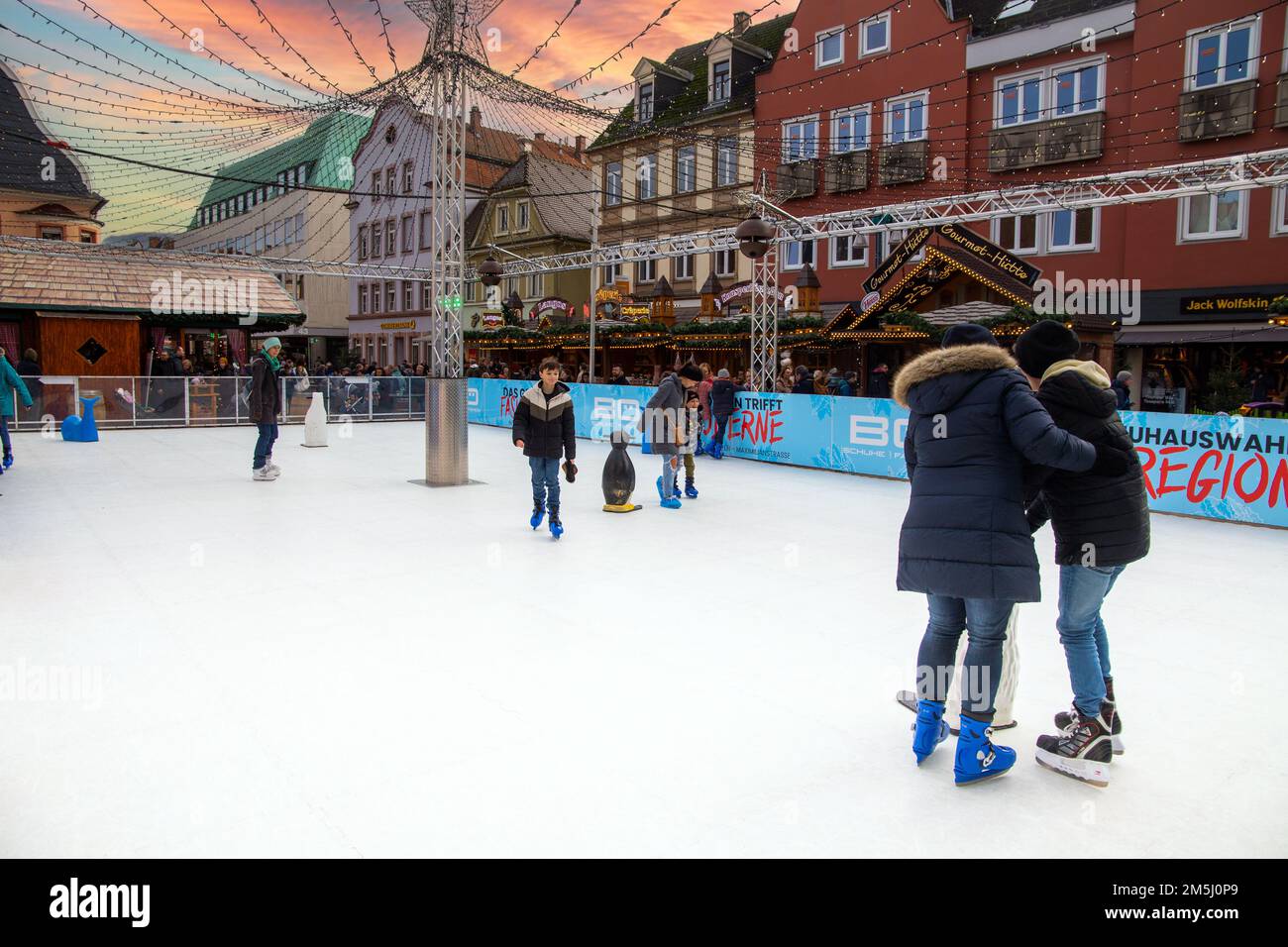 Ice skating at the Christmas market in Speyer, Rhineland-Palatinate: In ...