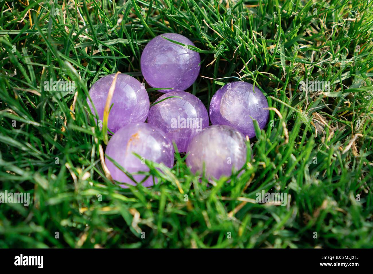 A closeup shot of amethyst stones isolated on the background of the ...