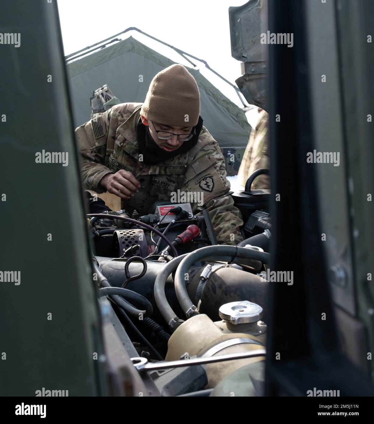 Spc. Bryan George, a wheeled vehicle mechanic with Company B, 725th ...