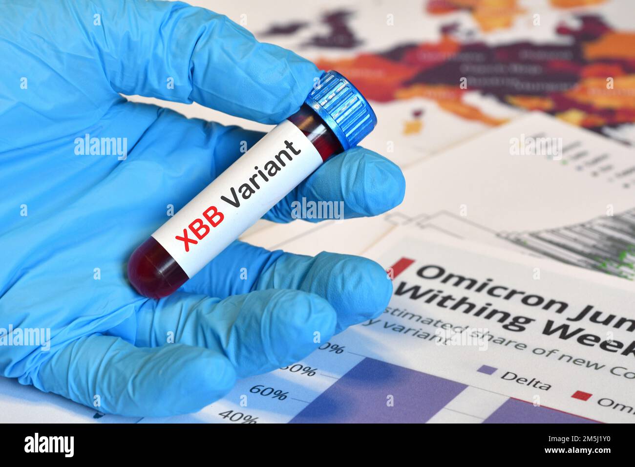 The doctor holds a blood test tube for the detection of the XBB Variant ...