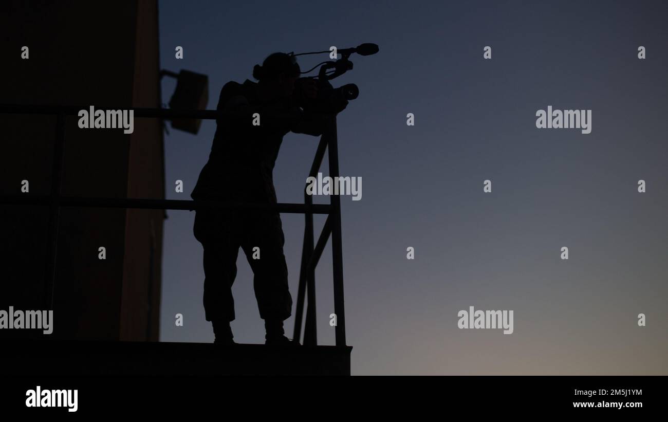 U.S. Marine Corps Lance Cpl. Megan Ozaki-Hamby, a combat photographer ...