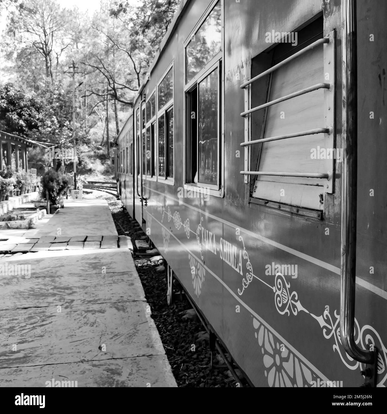 Toy Train moving on mountain slope, beautiful view, one side mountain ...