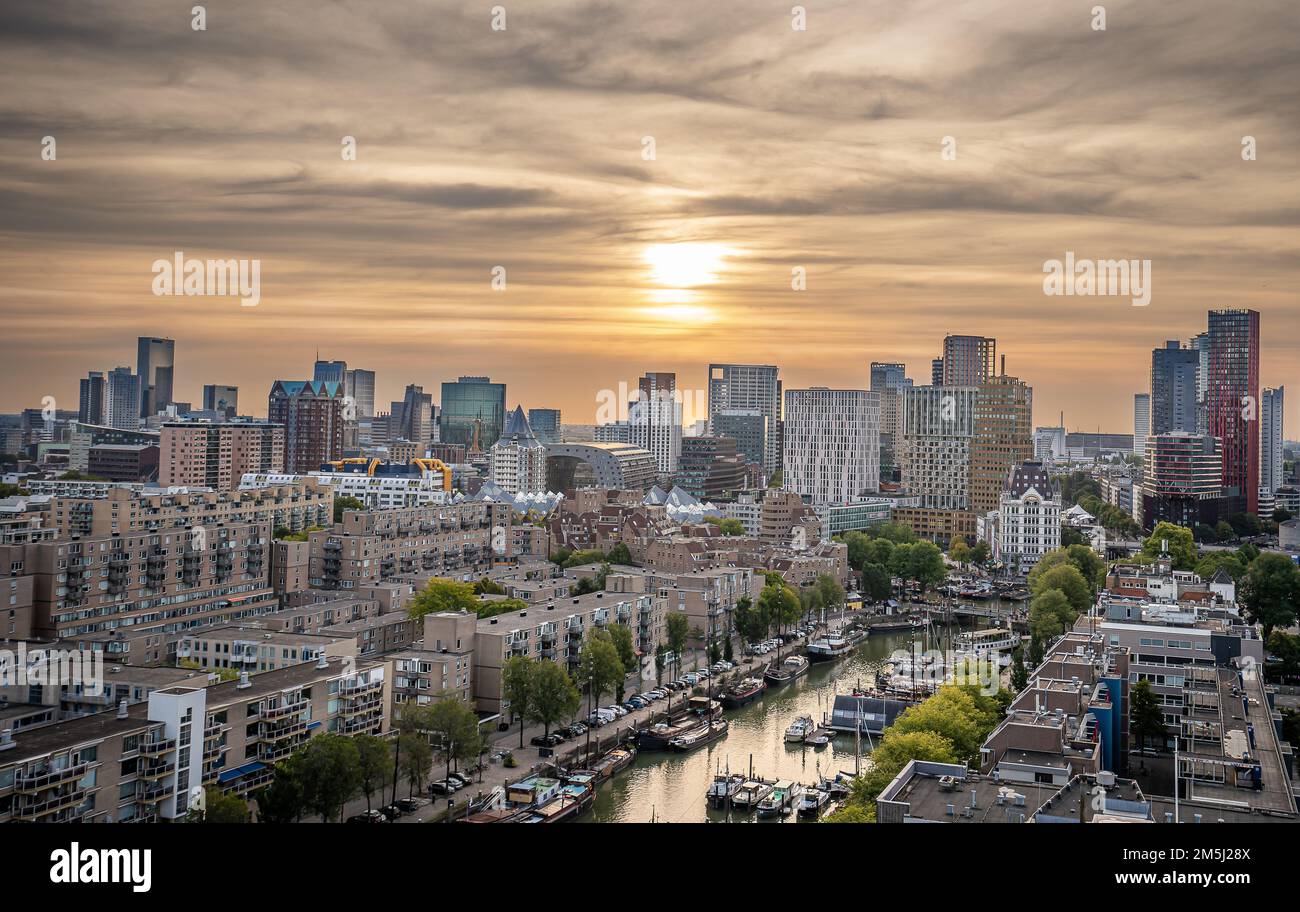 The skyline of Rotterdam cityscape, Netherlands at sunset showing the ...