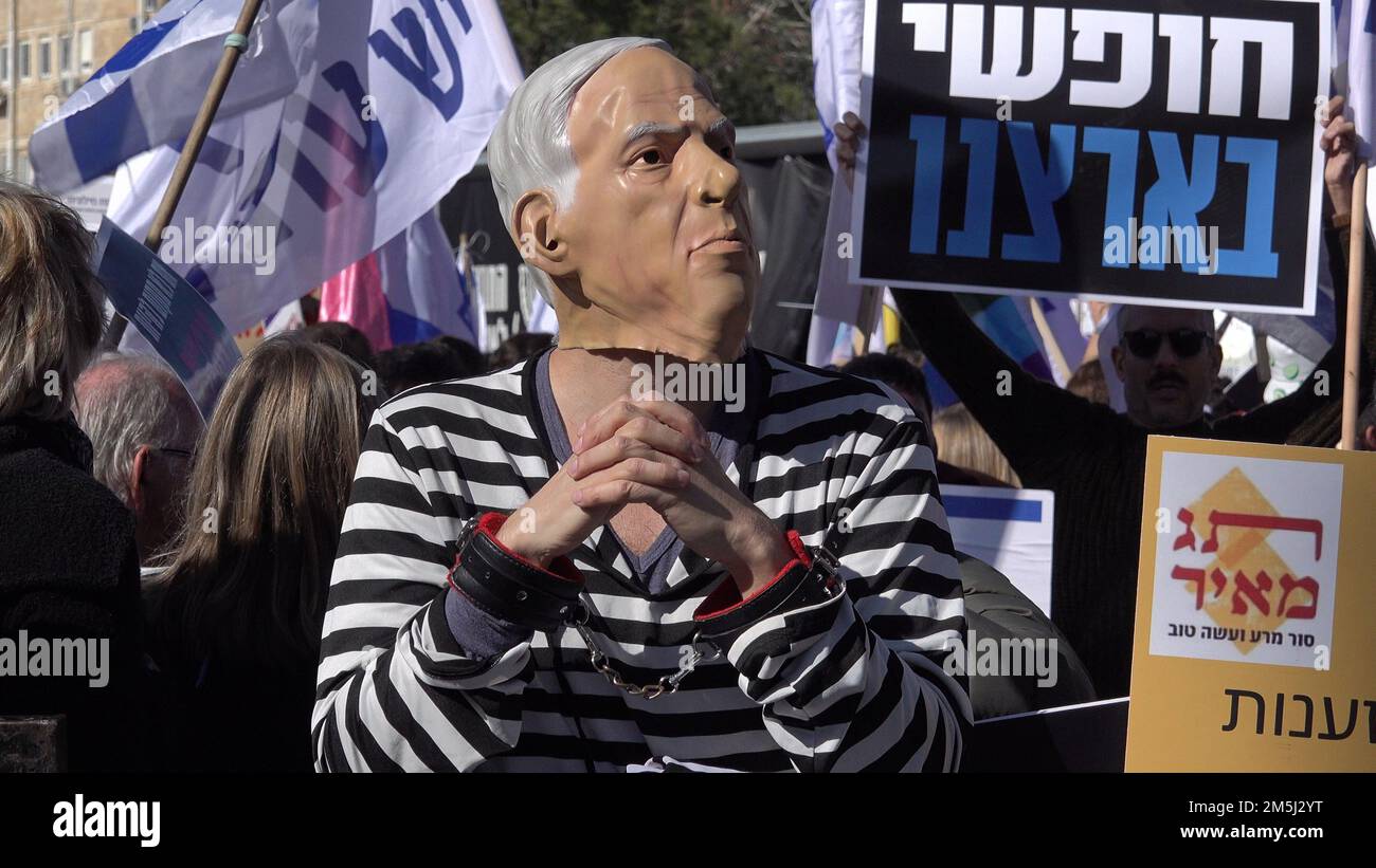 JERUSALEM, ISRAEL - DECEMBER 29: An Israeli protester wearing a mask ...
