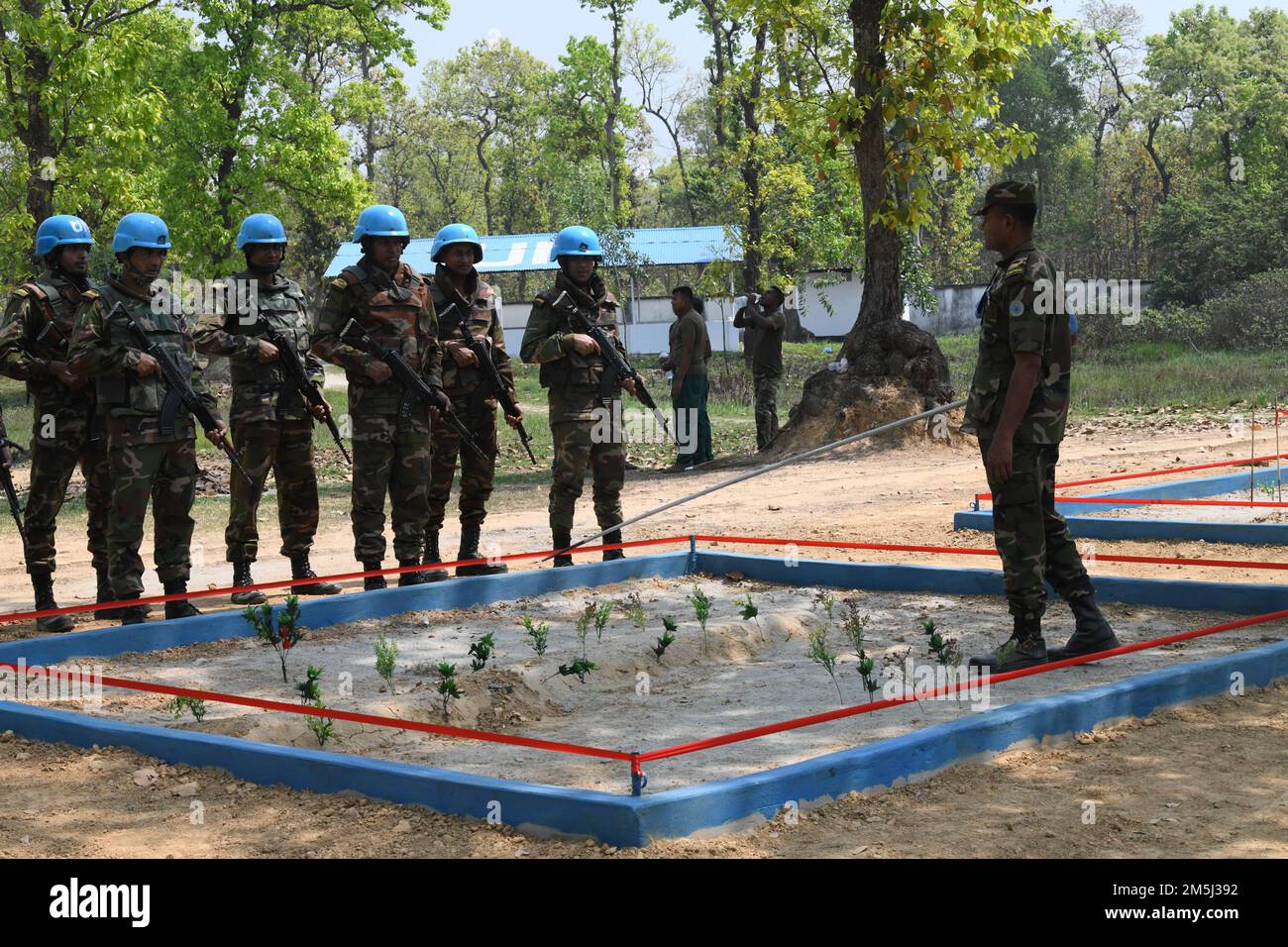 A Bangladeshi instructor instructs soldiers on improvised explosive ...
