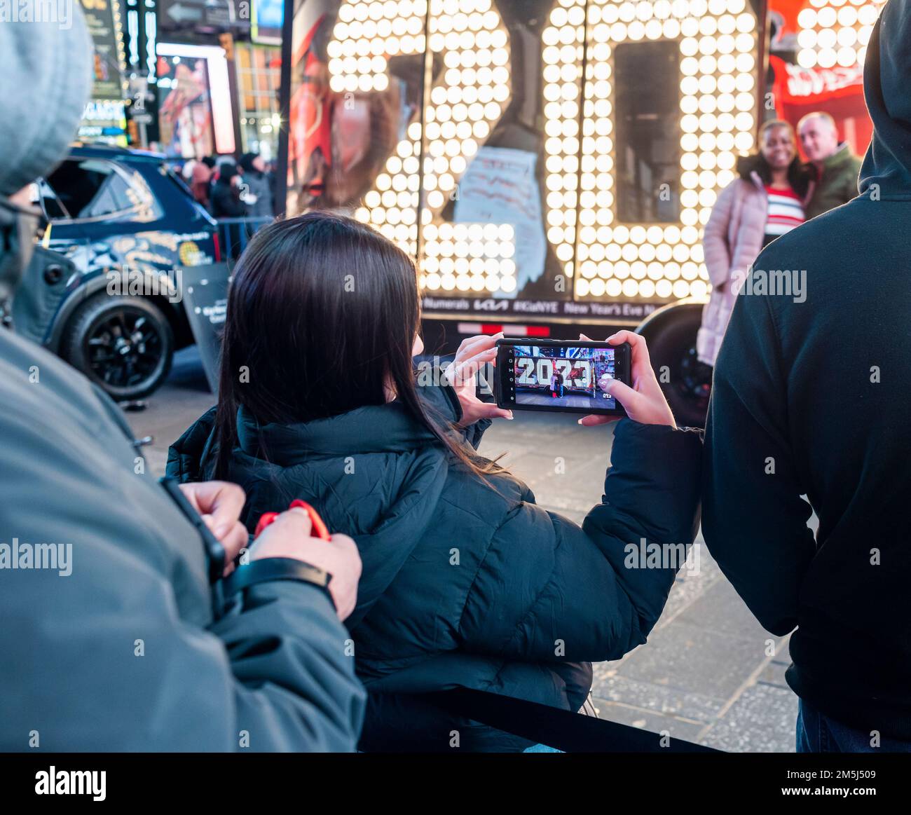Visitors to Times Square in New York flock to the “2023” numbers on the ...