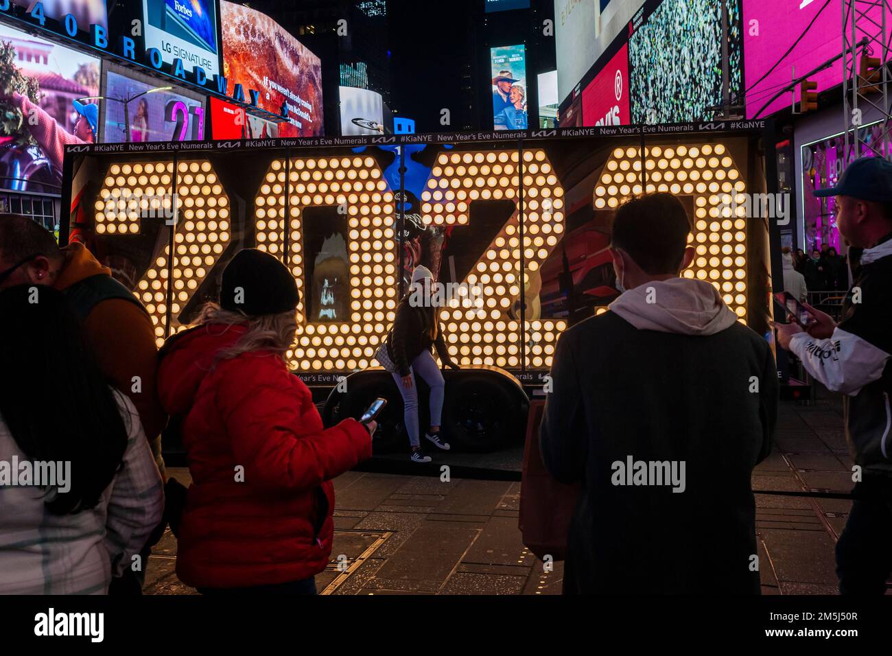 Visitors to Times Square in New York flock to the “2023” numbers on the ...