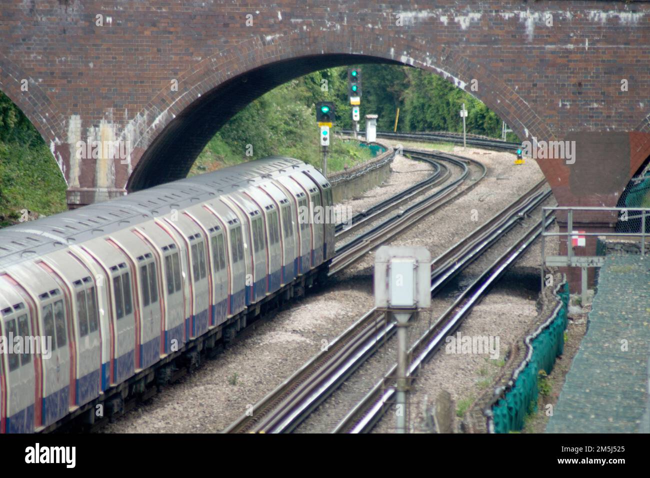 Train on rails hi-res stock photography and images - Alamy