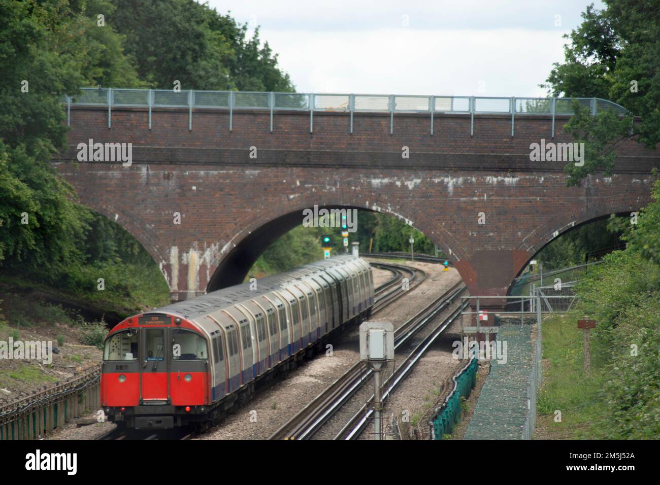 Train on rails Stock Photo - Alamy