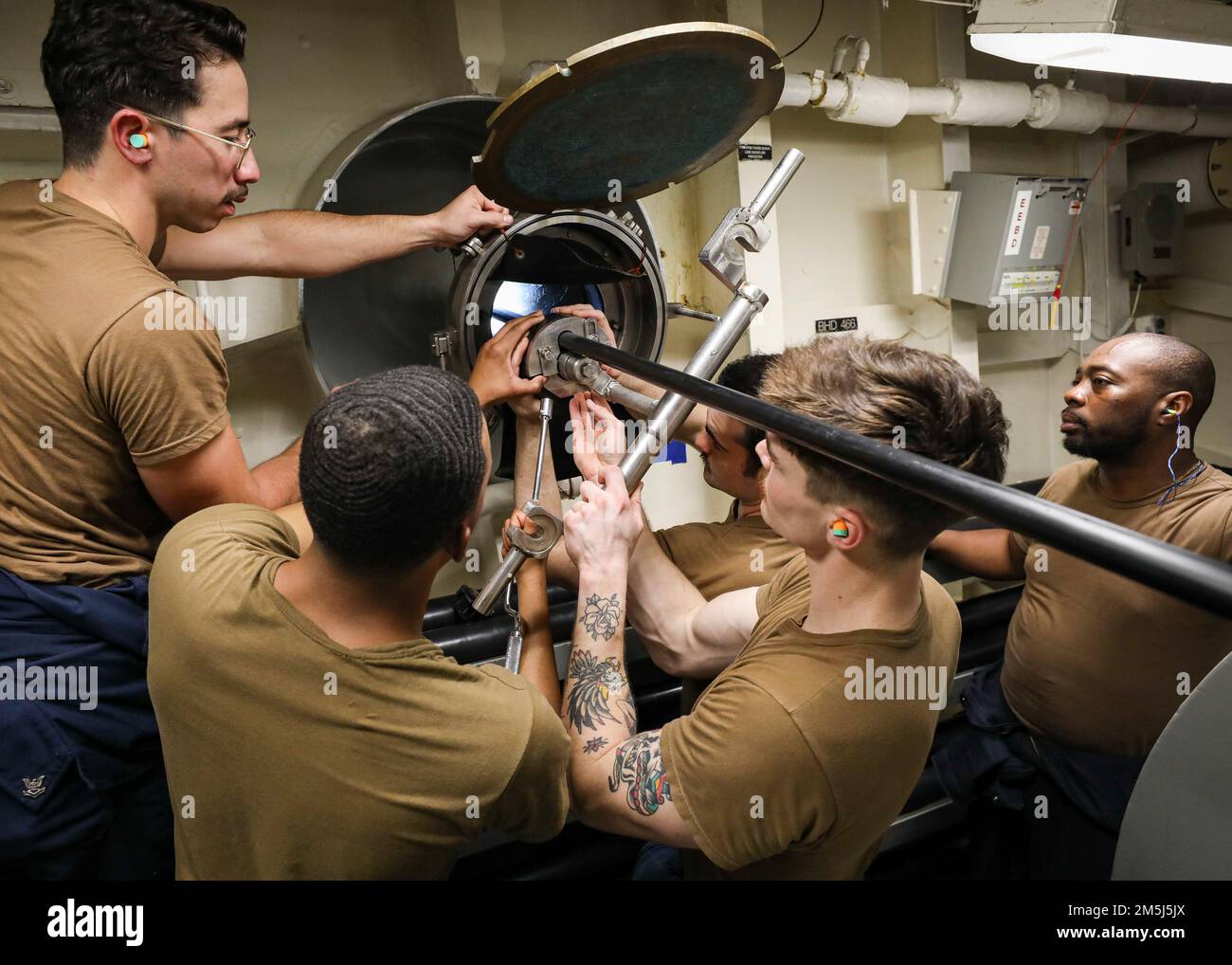 ATLANTIC OCEAN (March 18, 2022) – Sailors install the cable stopper ...