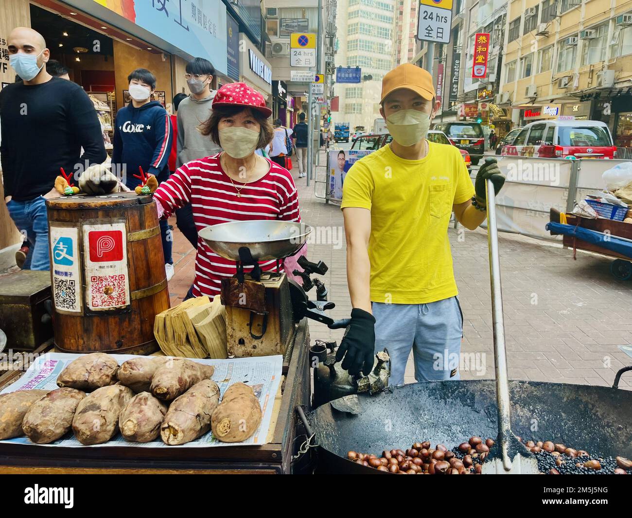 Kobus Tsang and his mother Chi Lee Tsang with their chestnut cart in ...